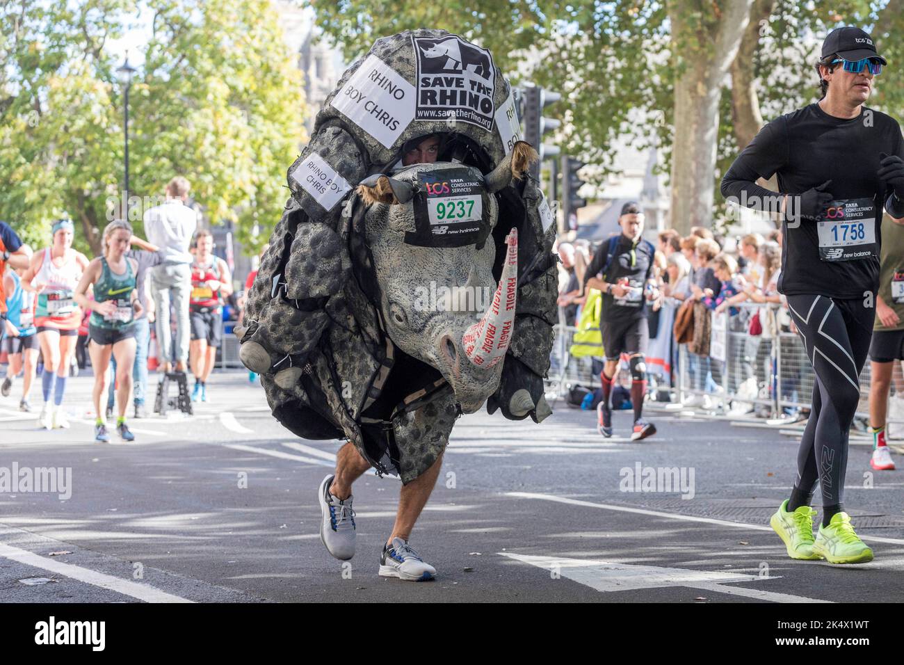TCS London Marathon 2022 takes place today. Runners run past Houses of ...