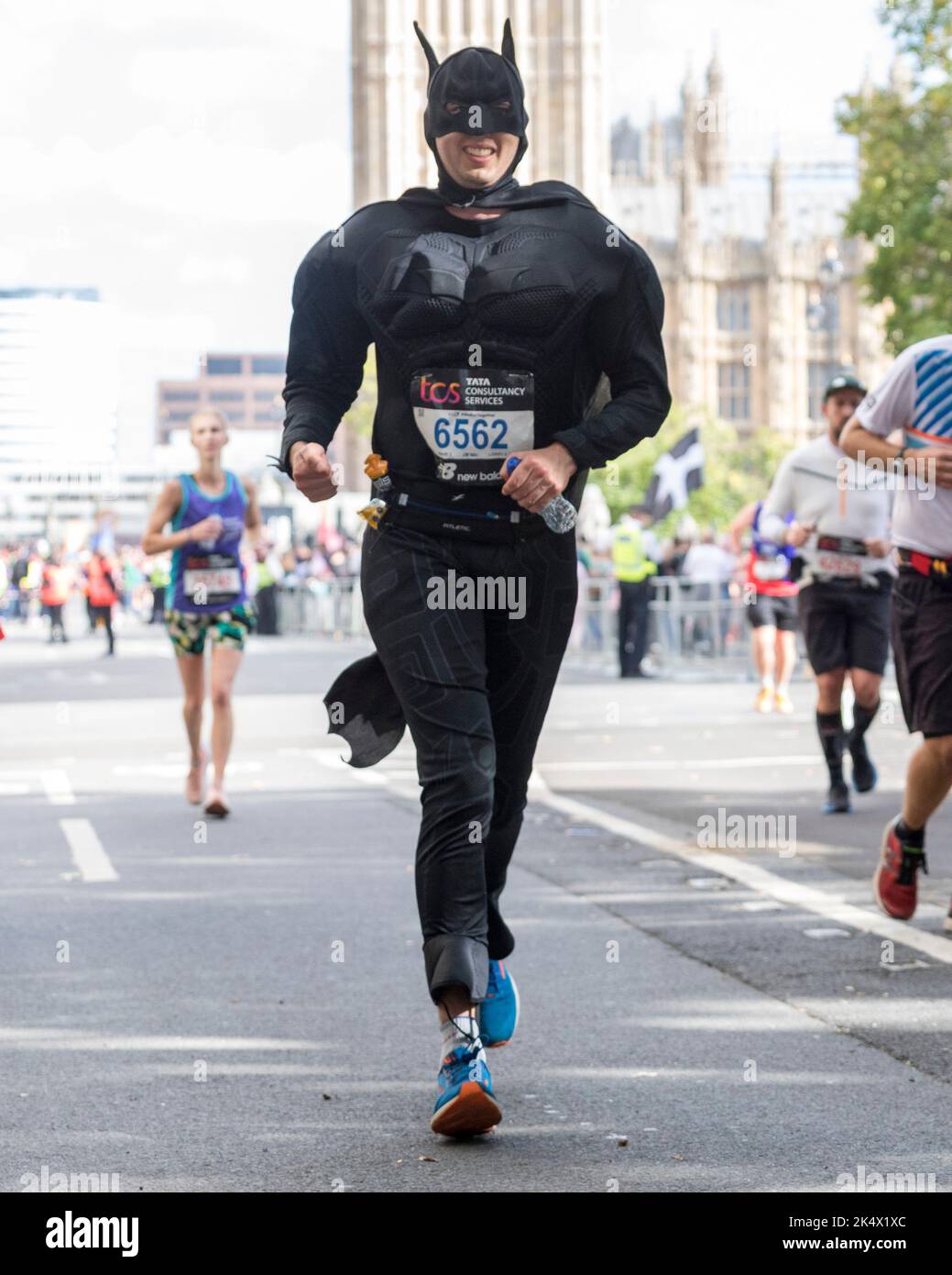 TCS London Marathon 2022 takes place today. Runners run past Houses of ...