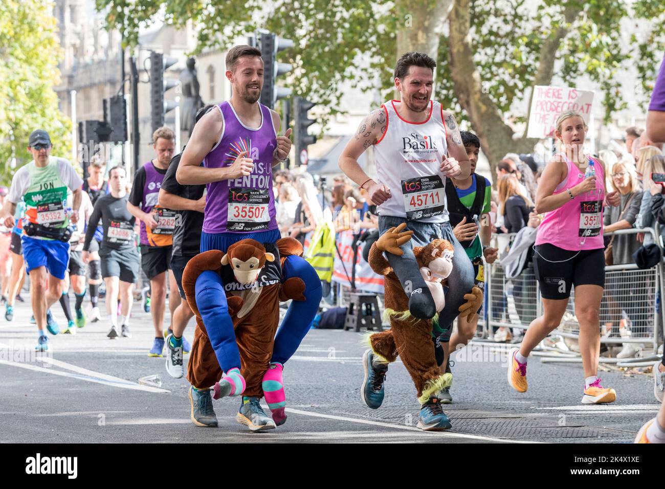 TCS London Marathon 2022 takes place today. Runners run past Houses of ...