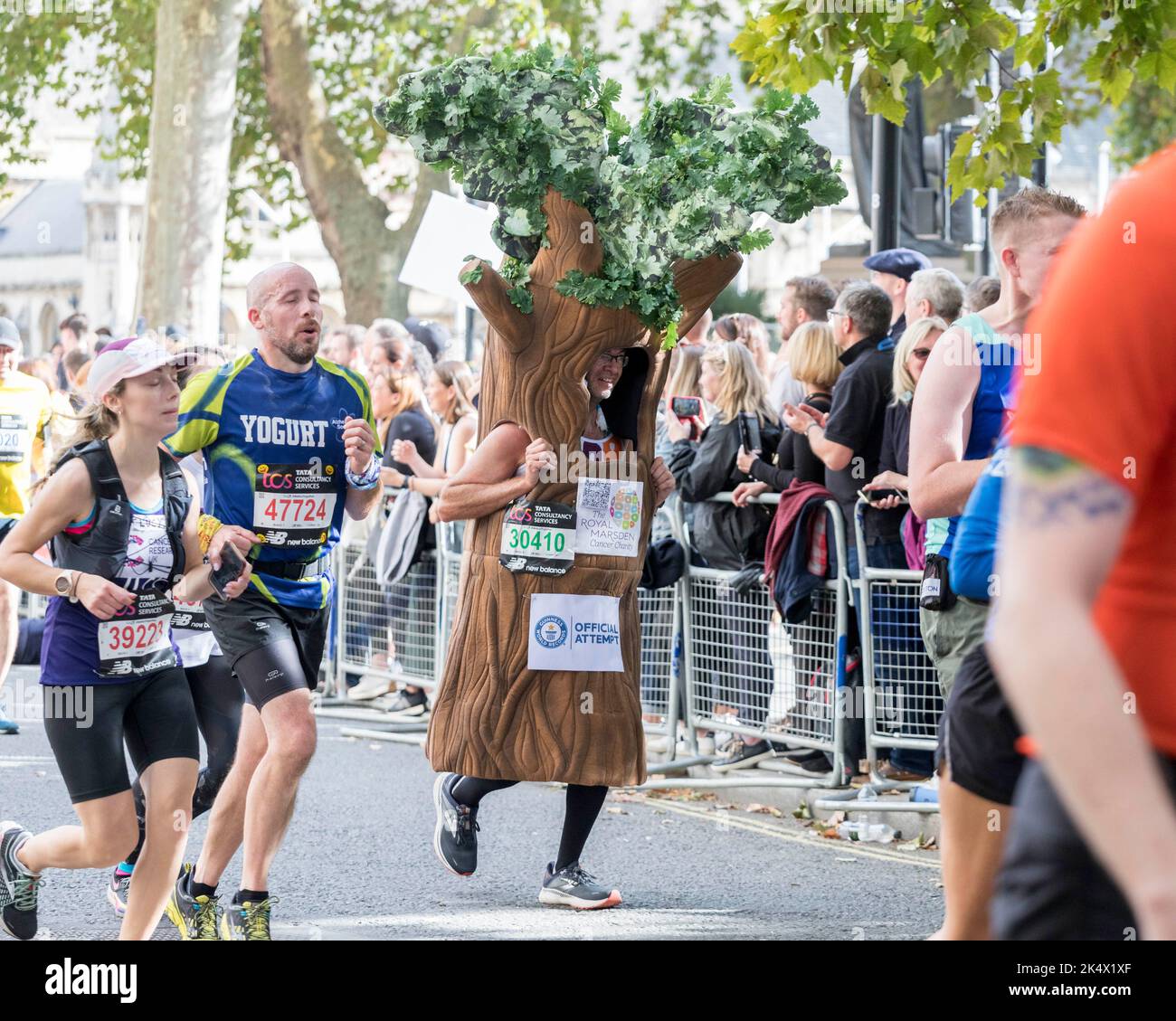 TCS London Marathon 2022 takes place today. Runners run past Houses of ...
