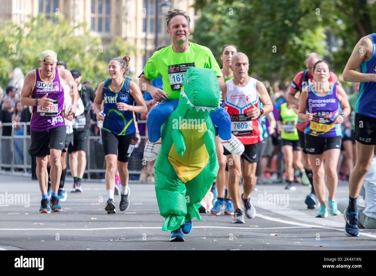 TCS London Marathon 2022 takes place today. Runners run past Houses of ...