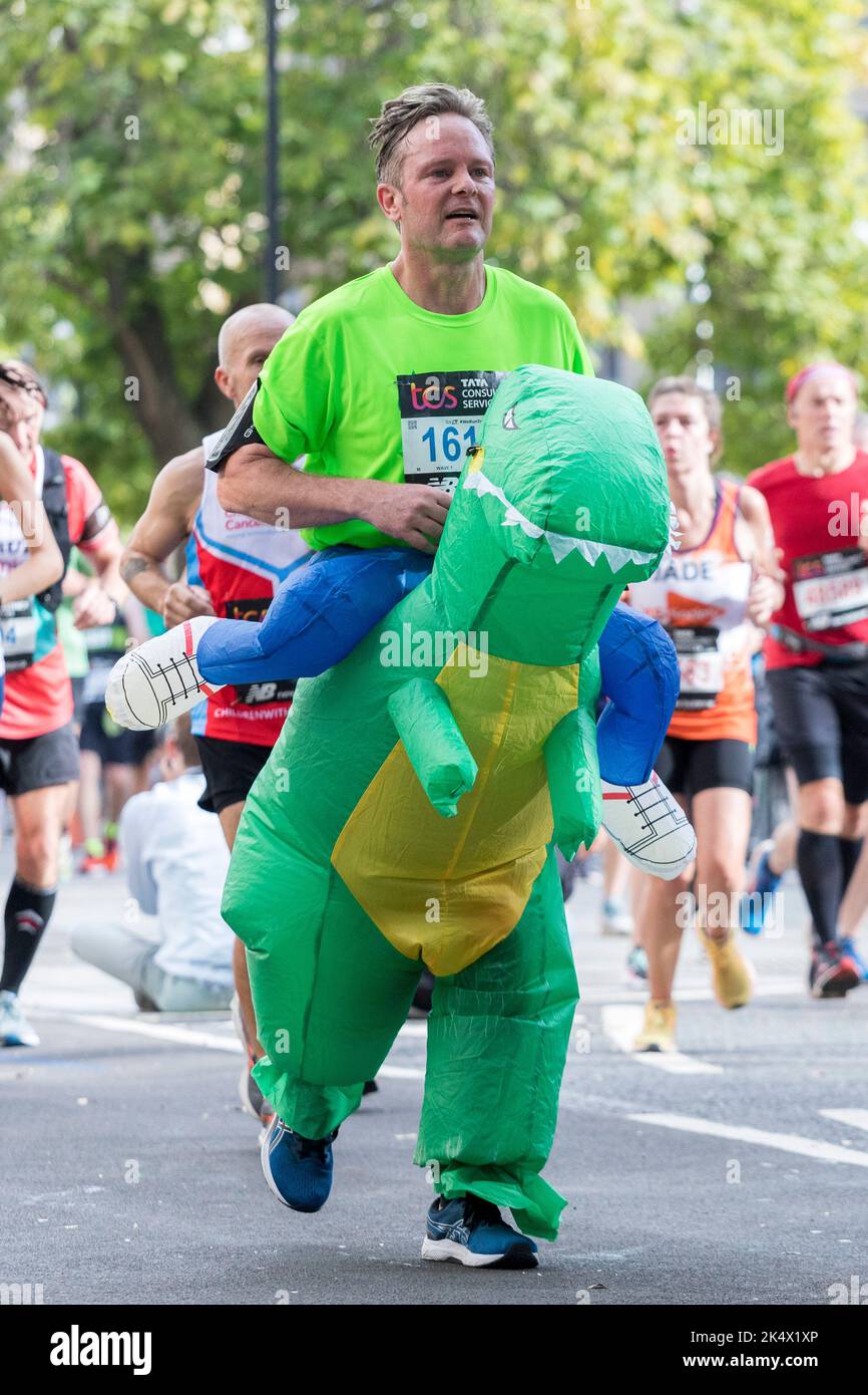 TCS London Marathon 2022 takes place today. Runners run past Houses of ...