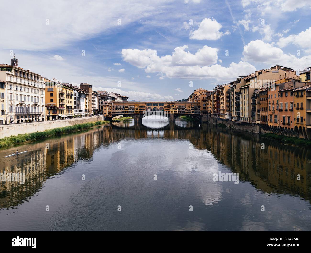 The old bridge Ponte Vecchio over the Amo river in Florence, Italy ...