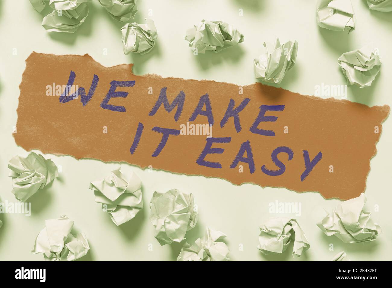 Sign displaying We Make It Easy. Word for Offering solutions ...