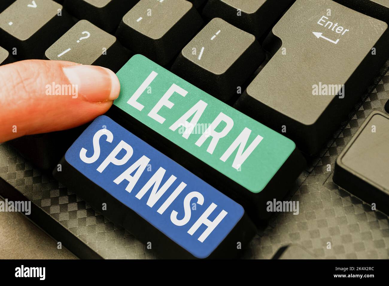 Hand writing sign Learn Spanish. Business concept to train writing and ...