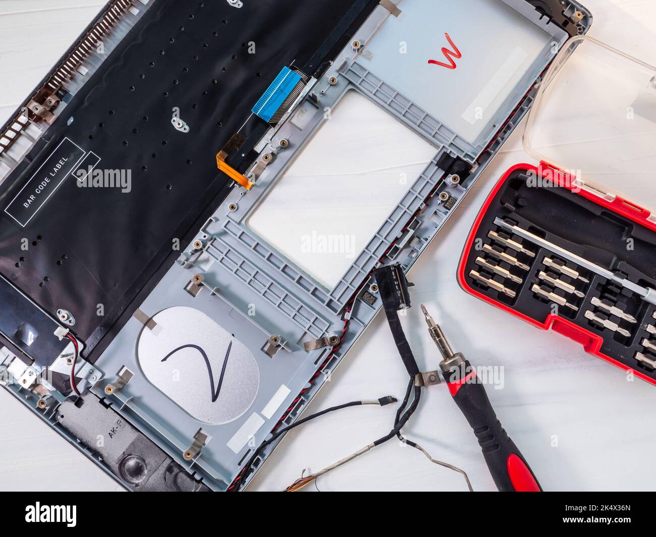 Repair and maintenance of computer laptop, laptop lid disassembled and ...