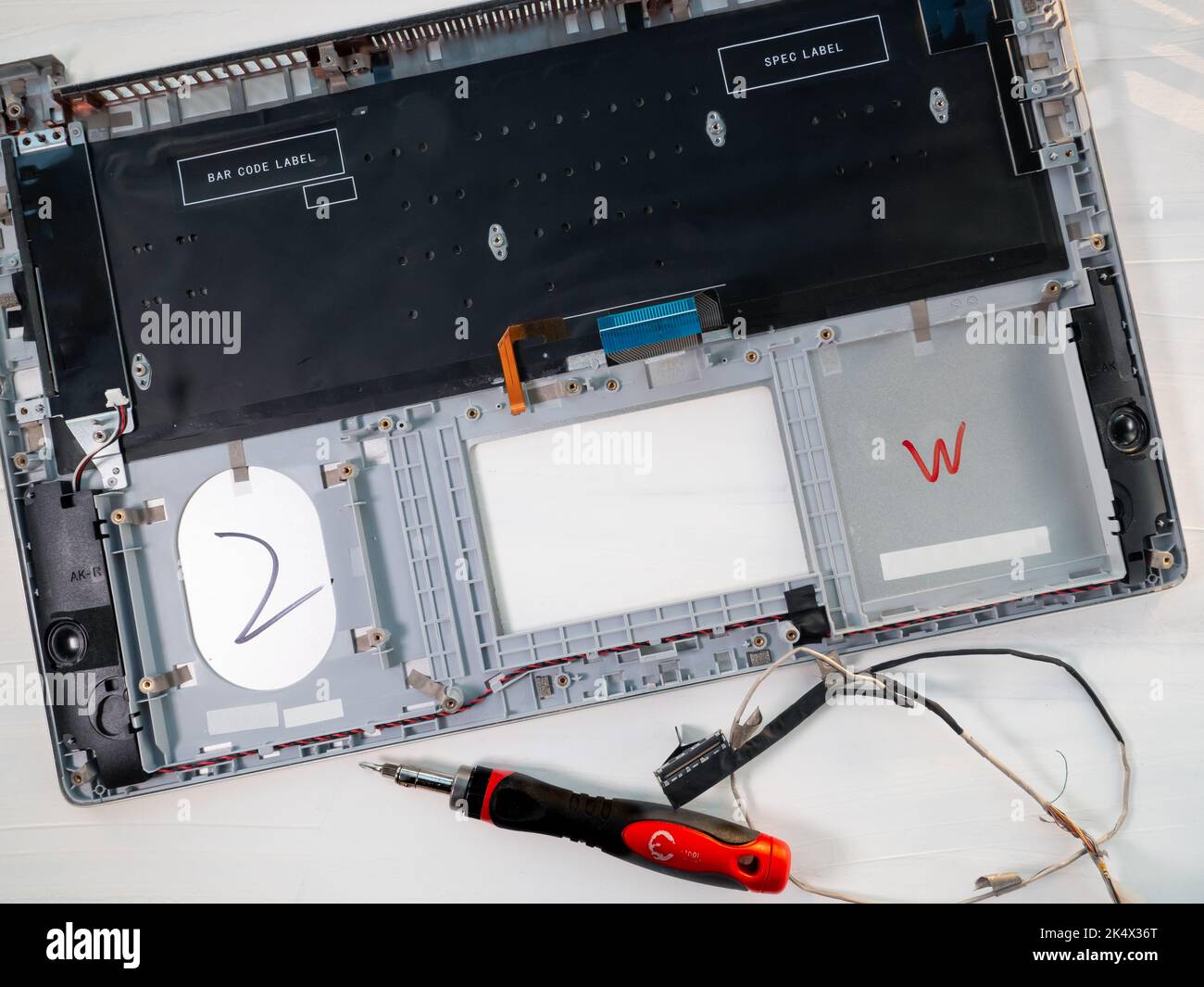 Repair and maintenance of computer laptop, laptop lid disassembled and ...