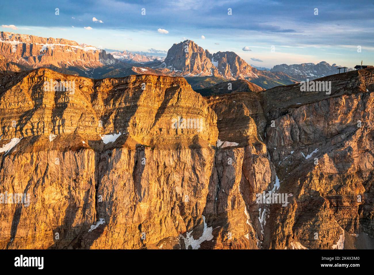 Aerial view of Sassolungo group, Sassopiatto, Gardena Valley and Seceda ...