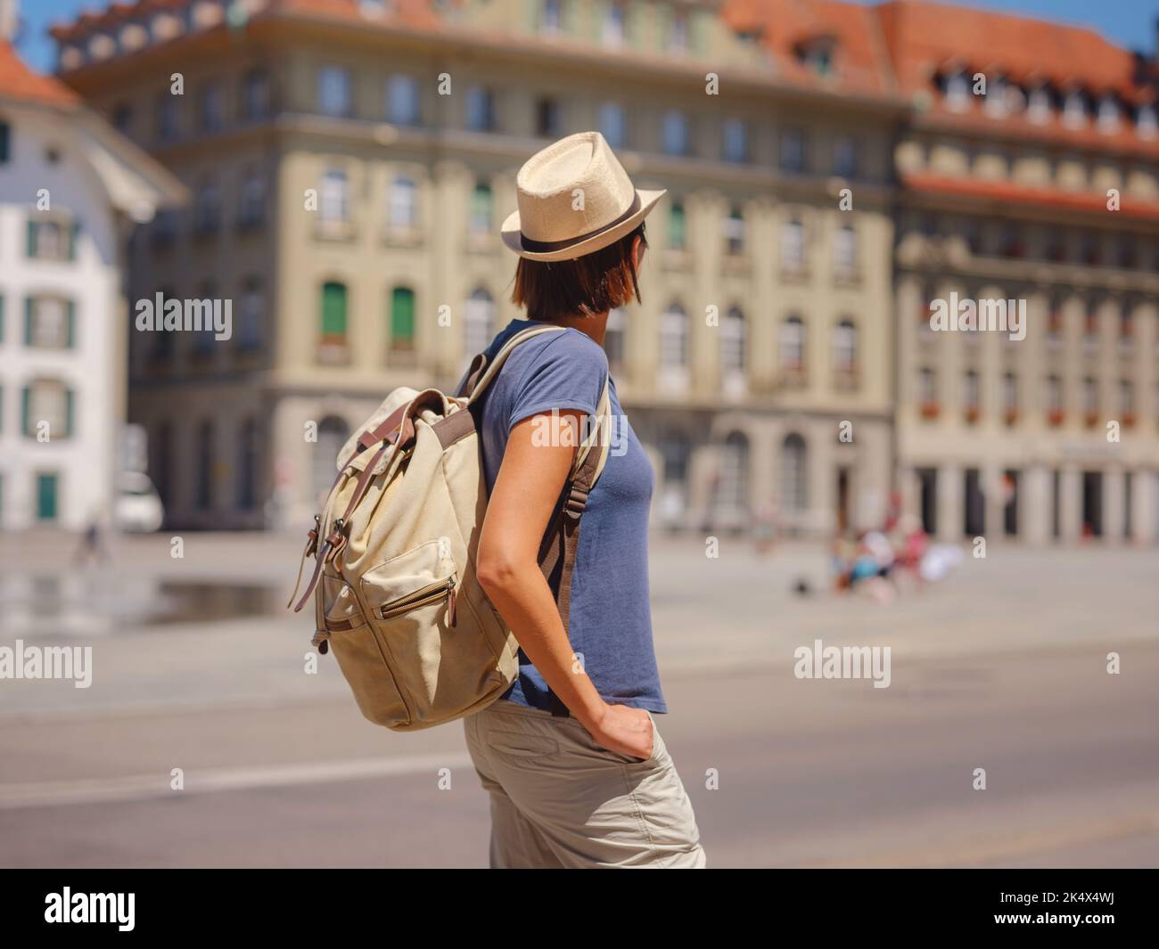 Woman having a great vacation in Switzerland, BErn, Federal palace ...