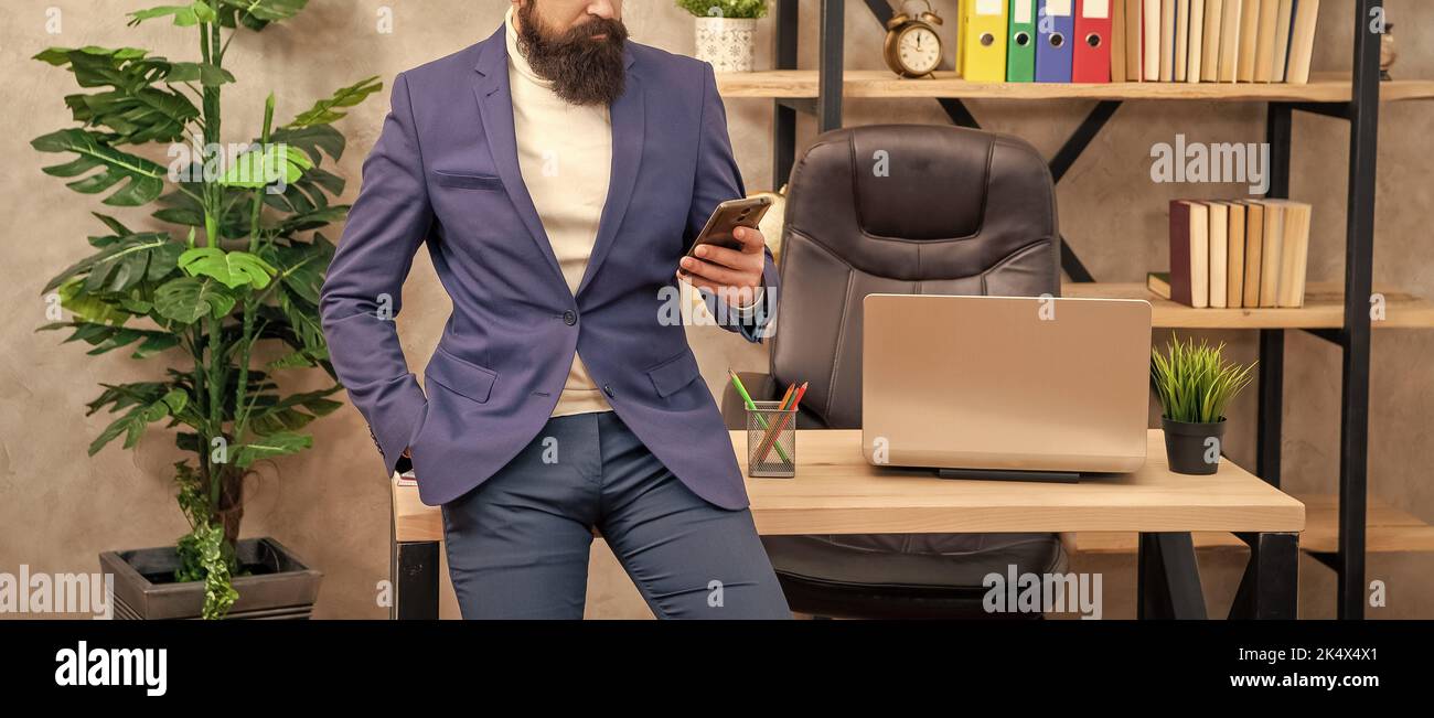 Professional man crop view using smartphone in office, mobility Stock ...