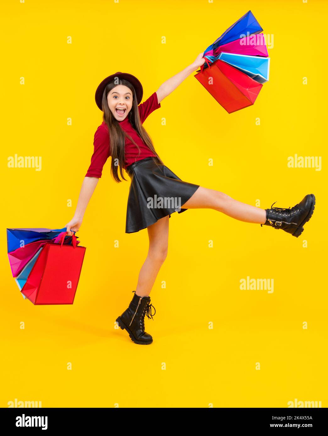 Teenager hold shopping bag enjoying sale. Child girl is ready to go ...