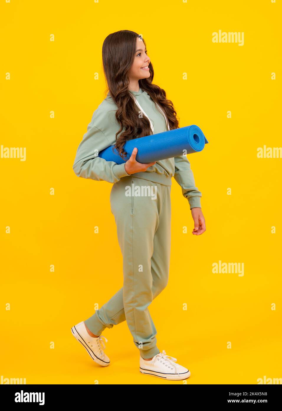 Teen girl dressed in sports uniform. Teenager in a posh stylish sports ...