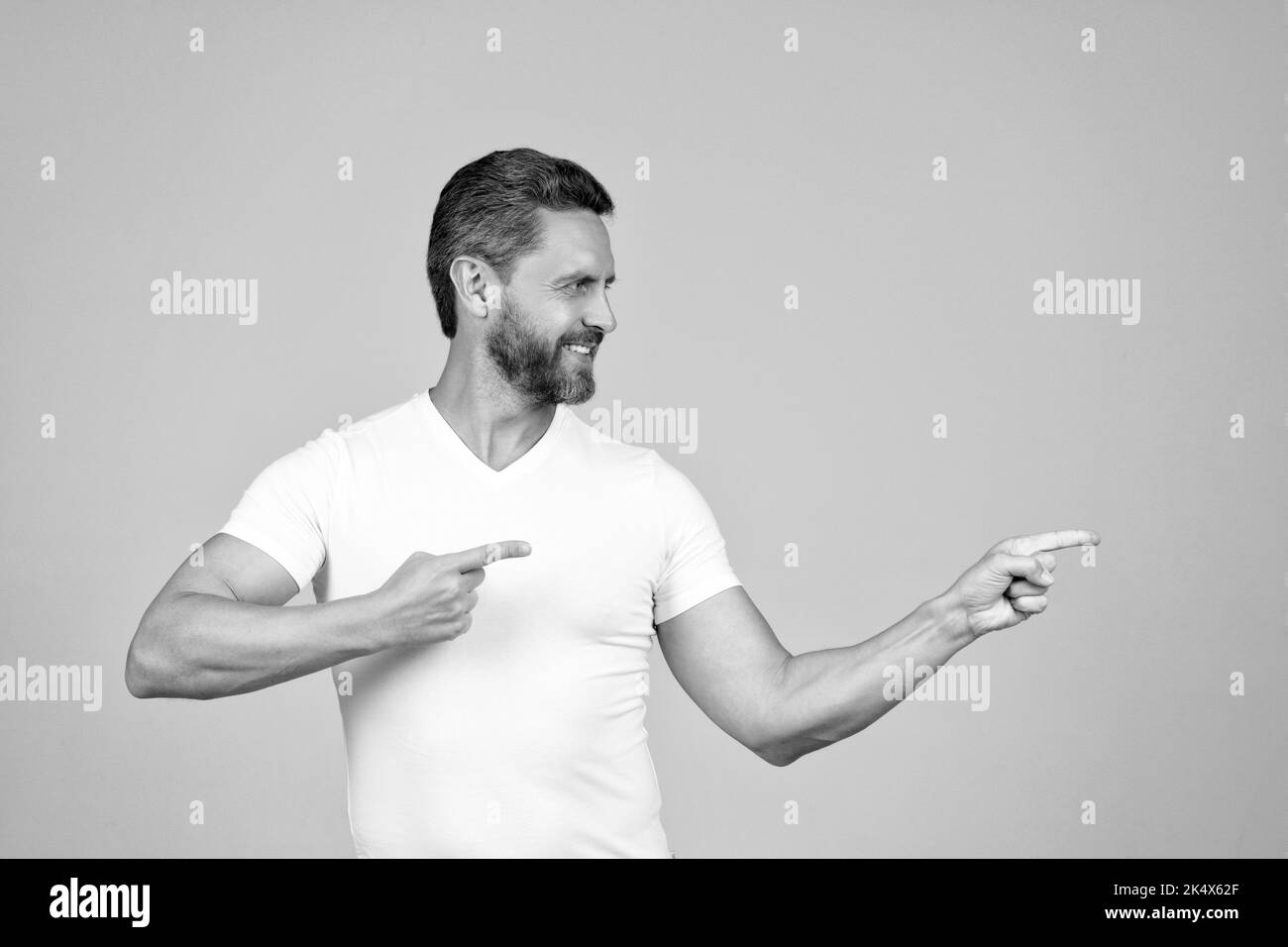 Place advert here. Happy man pointing fingers. Advertisement. Your ...