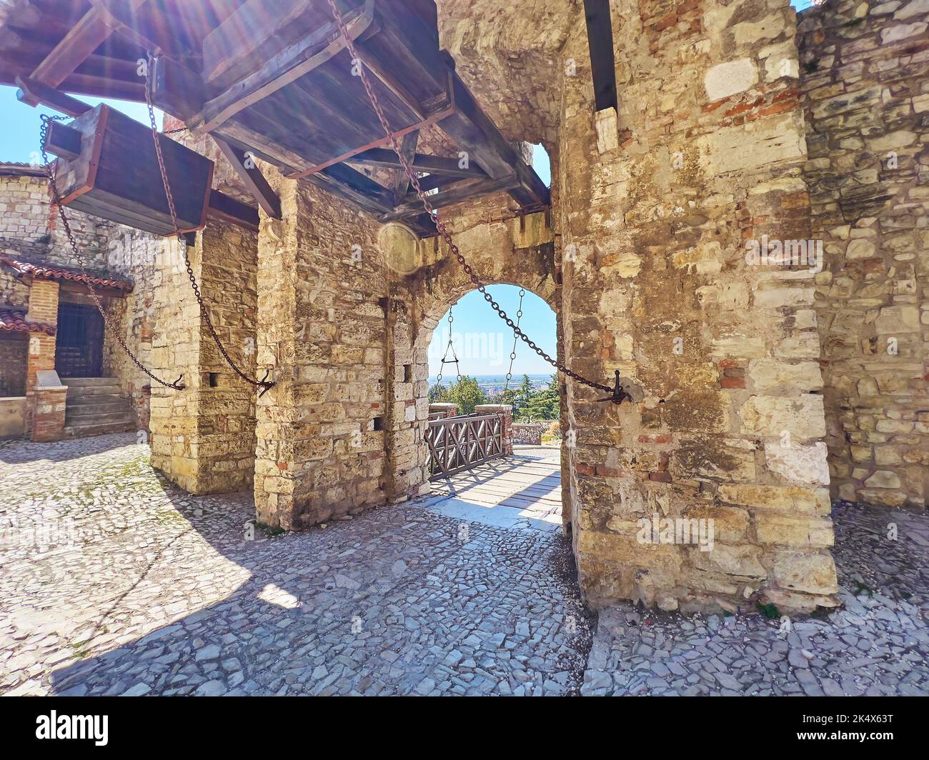 Historic Brescia Castle with stone court, massive gate with timber ...