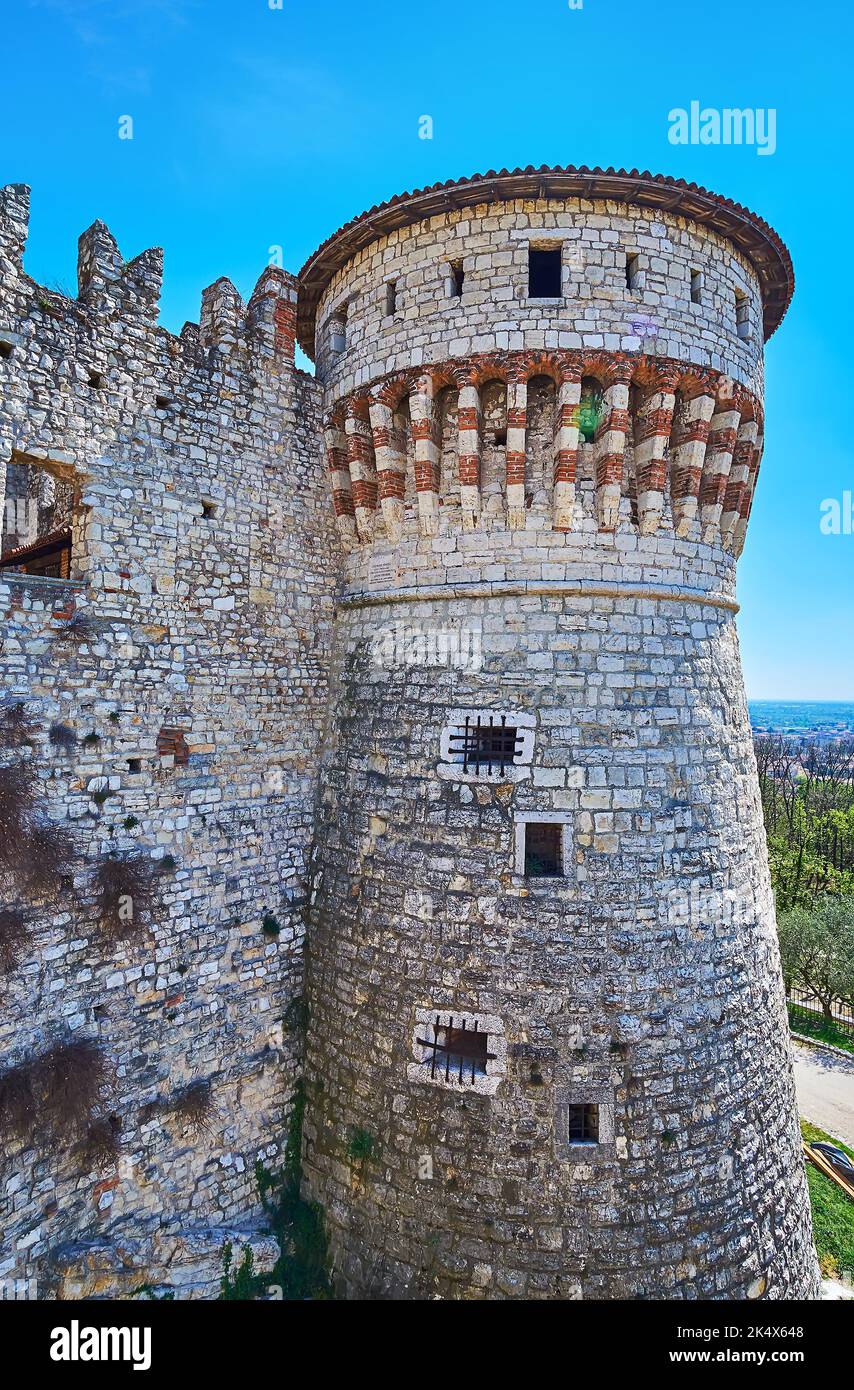 The medieval round Torre dei Prigionieri tower at the corner of Brescia ...