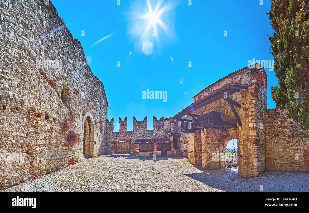 Panorama of the medieval stone courtyard of Brescia Castle with ...