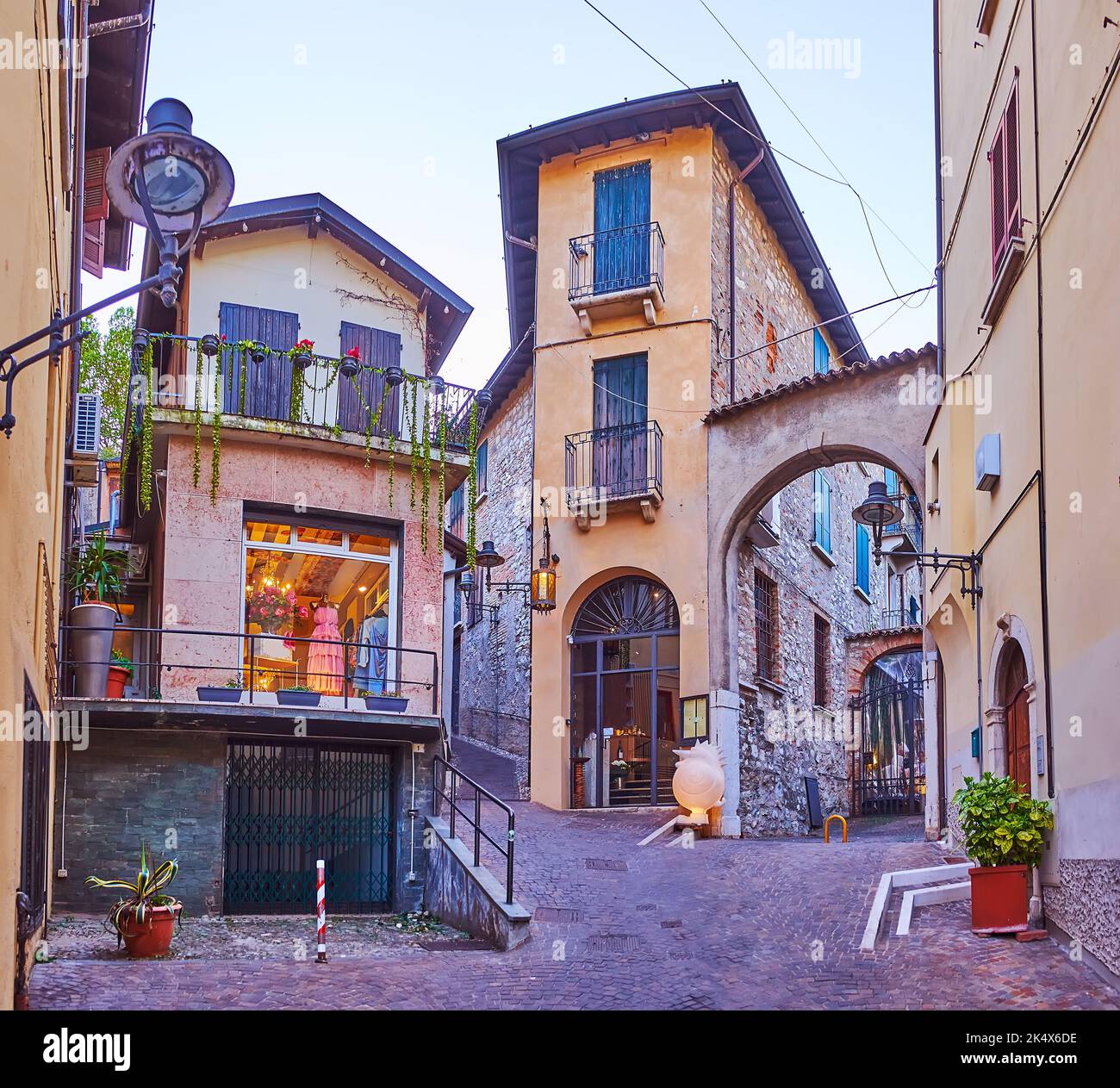 The maze of narrow vintage alleys in old town with shabby houses, cafes ...