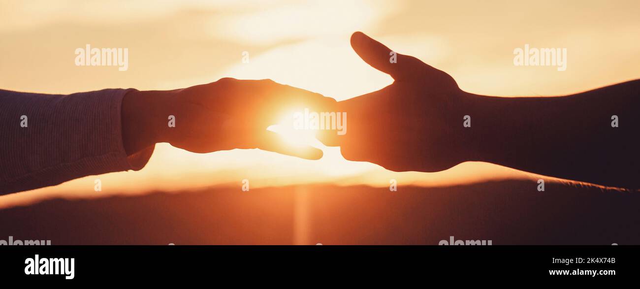 Giving a helping hand. Rescue, helping gesture or hands. Two hands ...