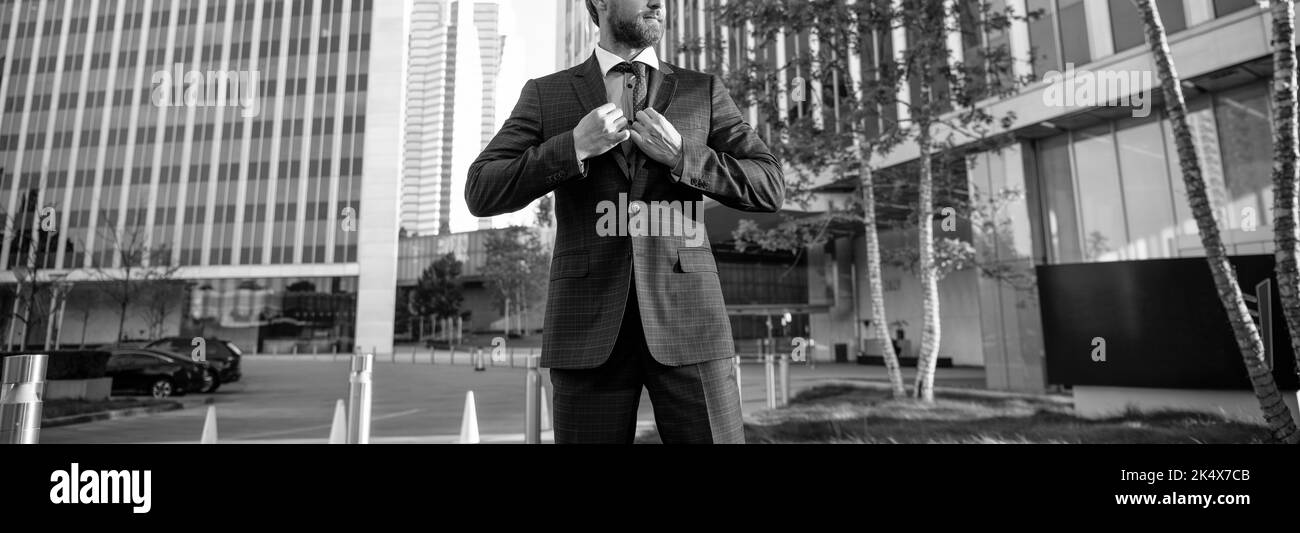 successful man in businesslike suit. entrepreneur outside the office ...