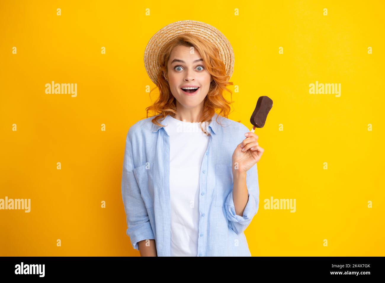 Summer concept. Glad positive woman holds tasty frozen ice cream ...
