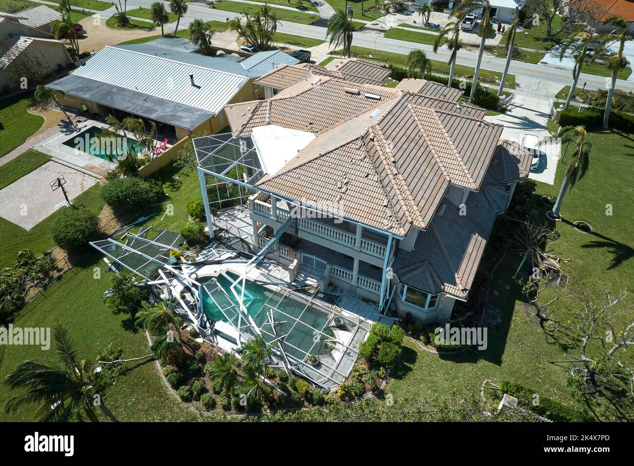 Hurricane Ian destroyed house in Florida residential area. Natural ...