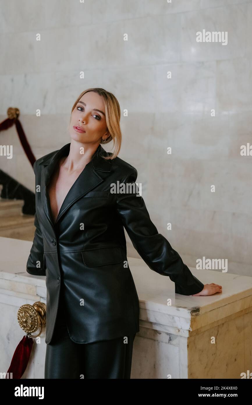 Blonde woman in leather hi-res stock photography and images - Alamy