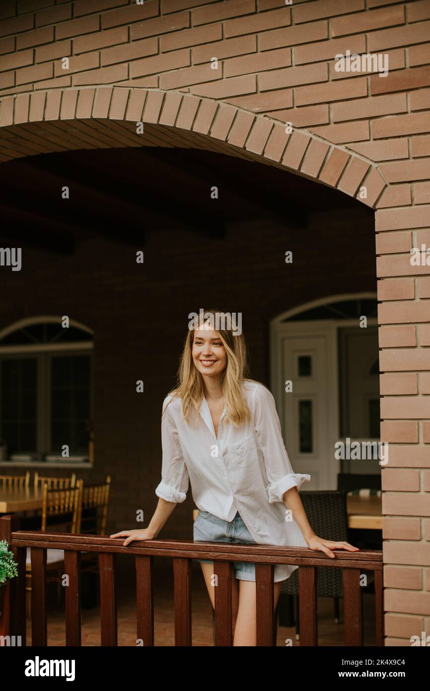 Woman standing on terrace outdoor hi-res stock photography and images ...