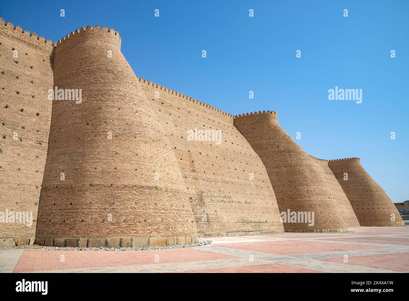 At the wall of the old fortress Ark, Bukhara, Uzbekistan Stock Photo ...