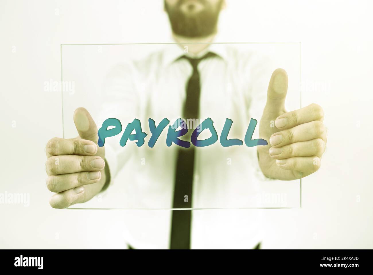 Handwriting text Payroll. Internet Concept total of all compensation ...