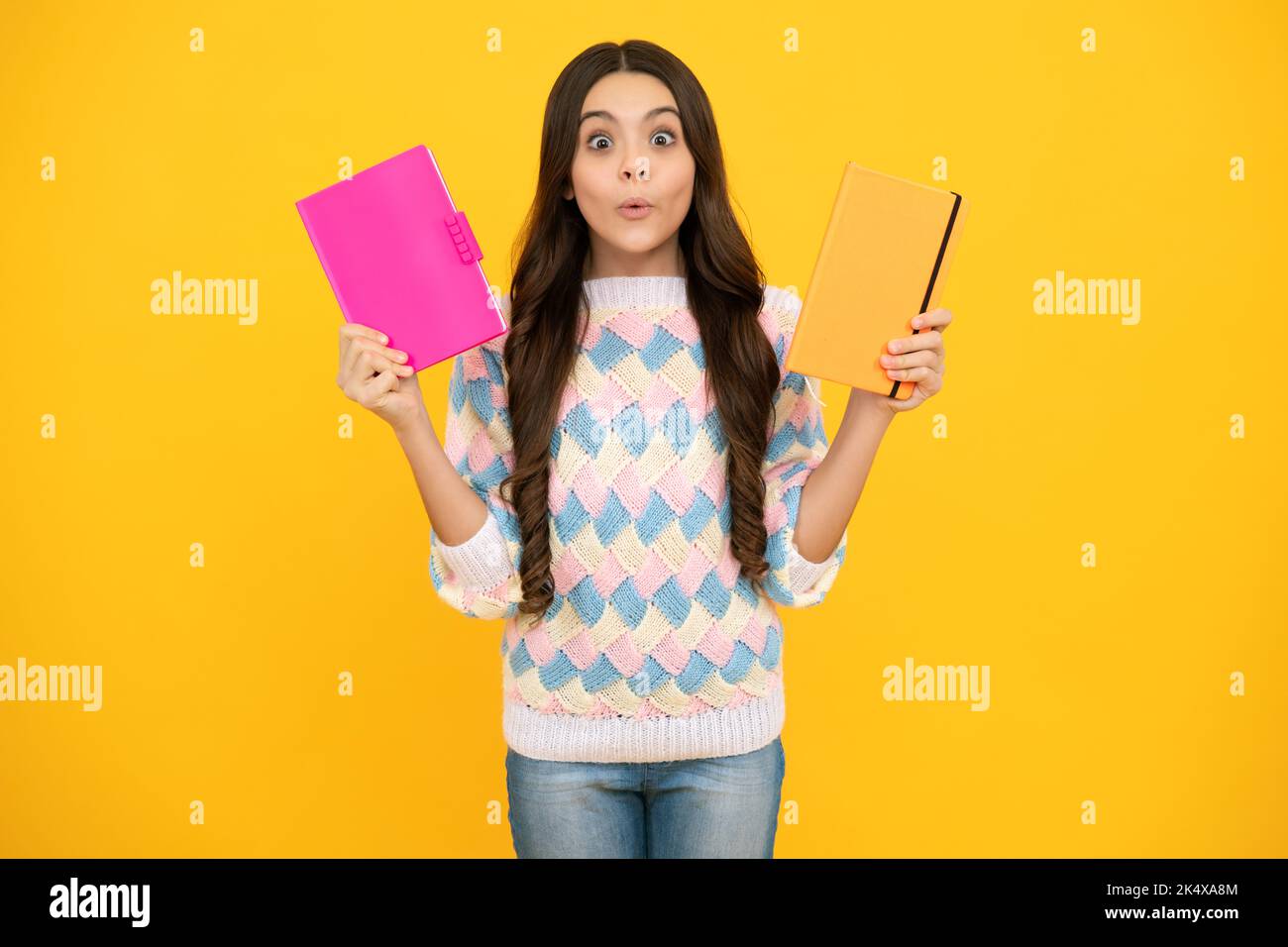 Funny face. Back to school. Portrait of teenage school girl with books ...