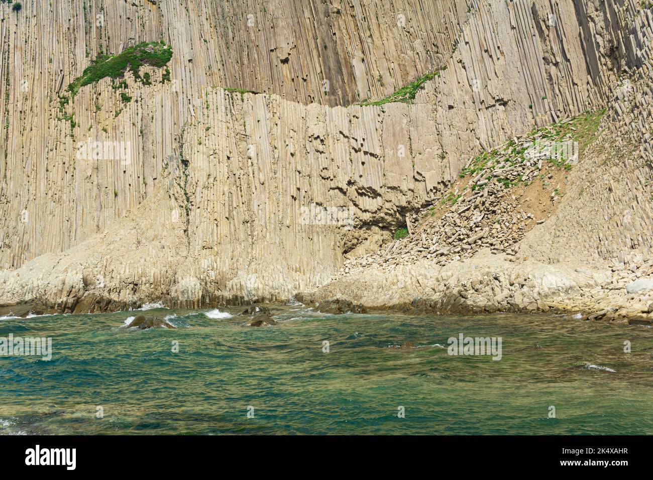 natural landscape with a sheer cliff folded columnar basalt on the ...