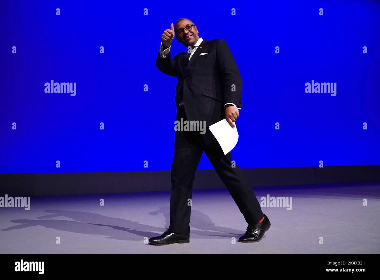Foreign Secretary James Cleverly leaves the stage after speaking during ...