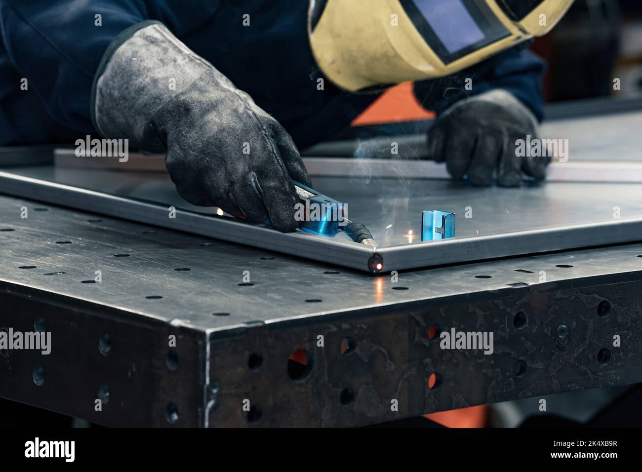 welding of metal structures on the welding table Stock Photo - Alamy