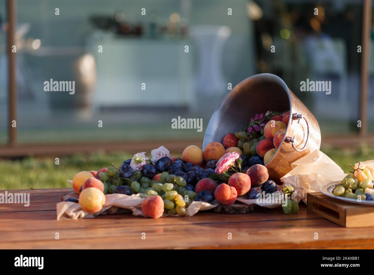 Autumn fruits front view in metalic basket on wood table Stock Photo ...