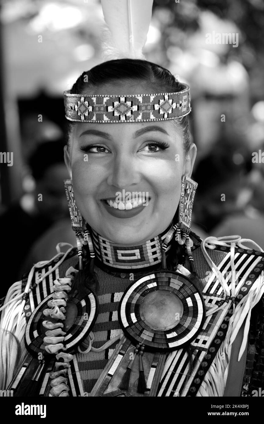 A Native American woman competes in the Native American Clothing ...