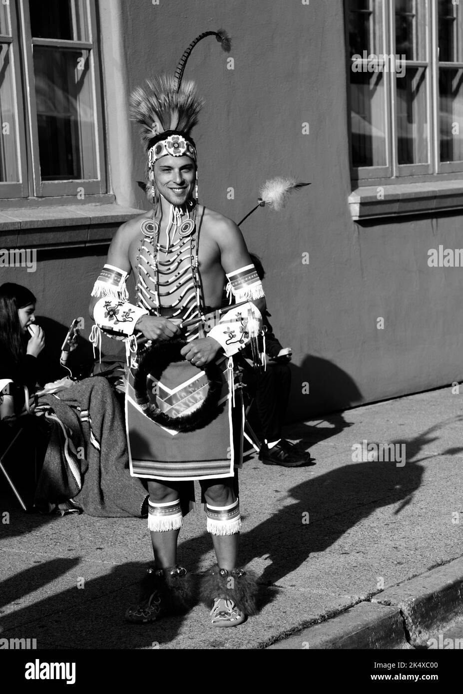 A Native American man competes in the Native American Clothing Contest ...