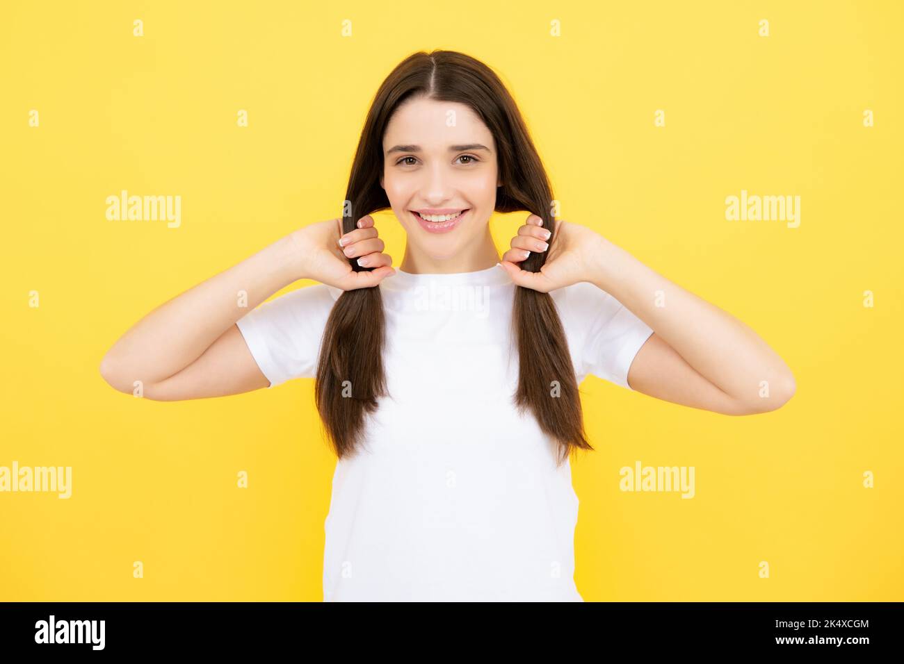 Happy smiling woman portrait. Attractive young pretty cheerful girl in ...