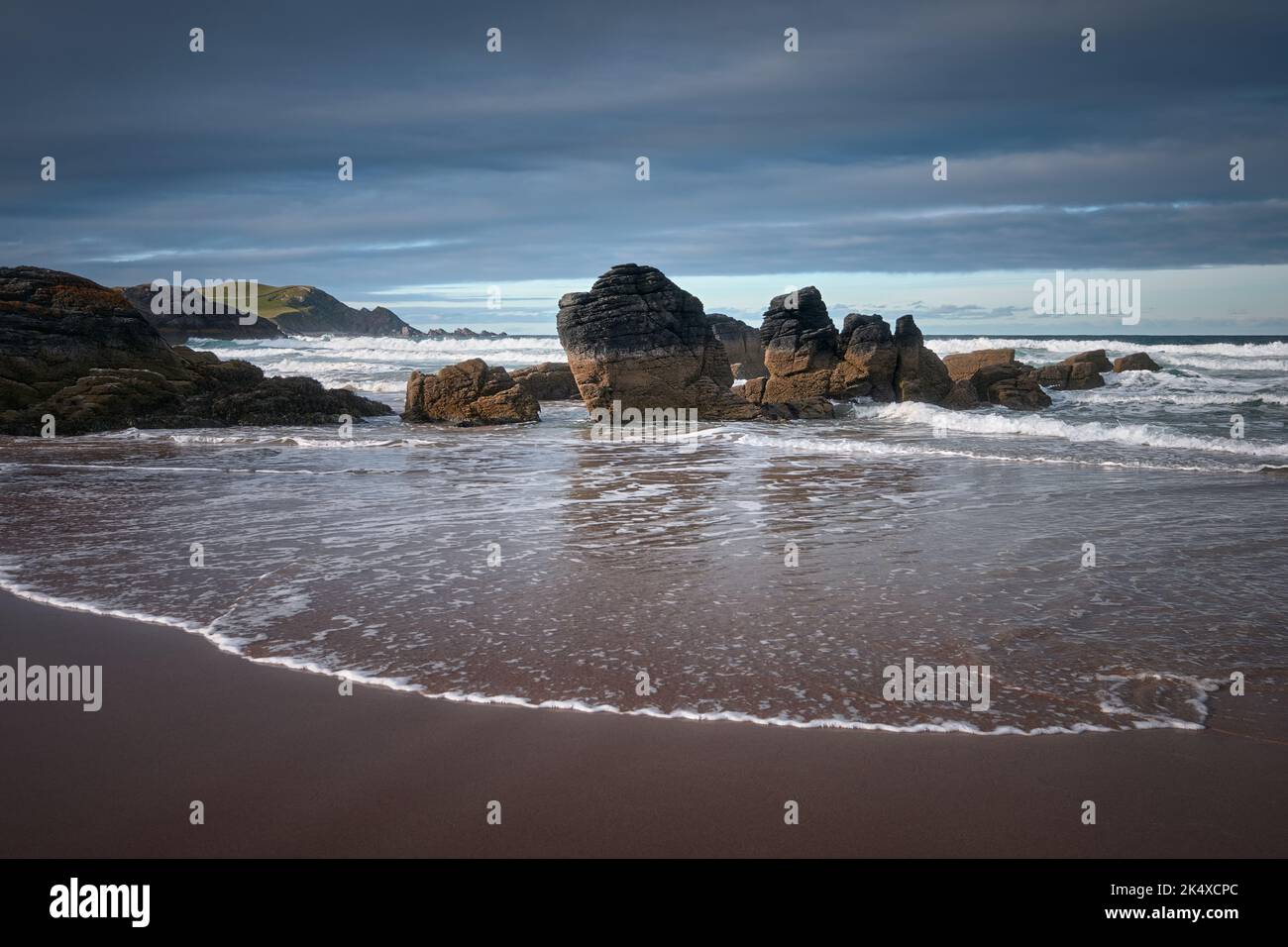 Landscape a beautiful beach with sea cliffs and waves in the north of ...