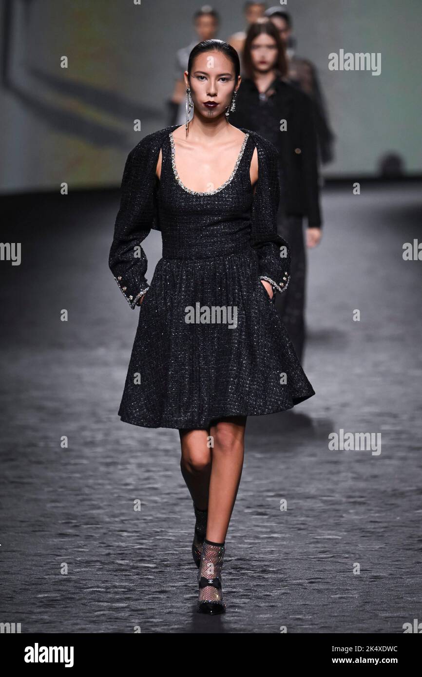 Model Quannah Chasinghorse walks on the runway at the Chanel fashion ...