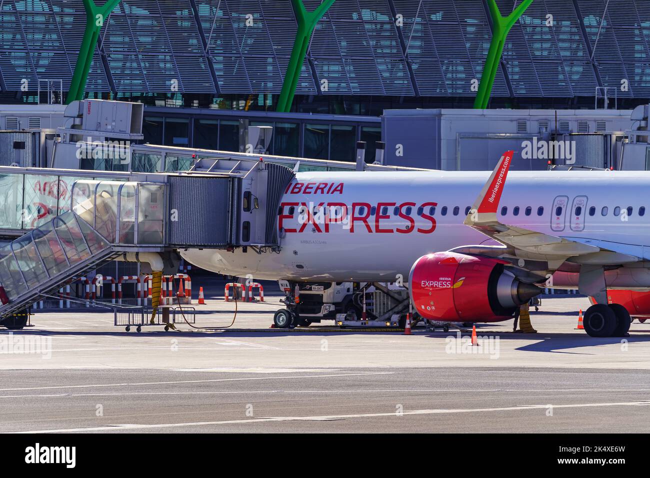 Madrid, Spain, October 30, 2022: Plane parked in the terminal and ready ...