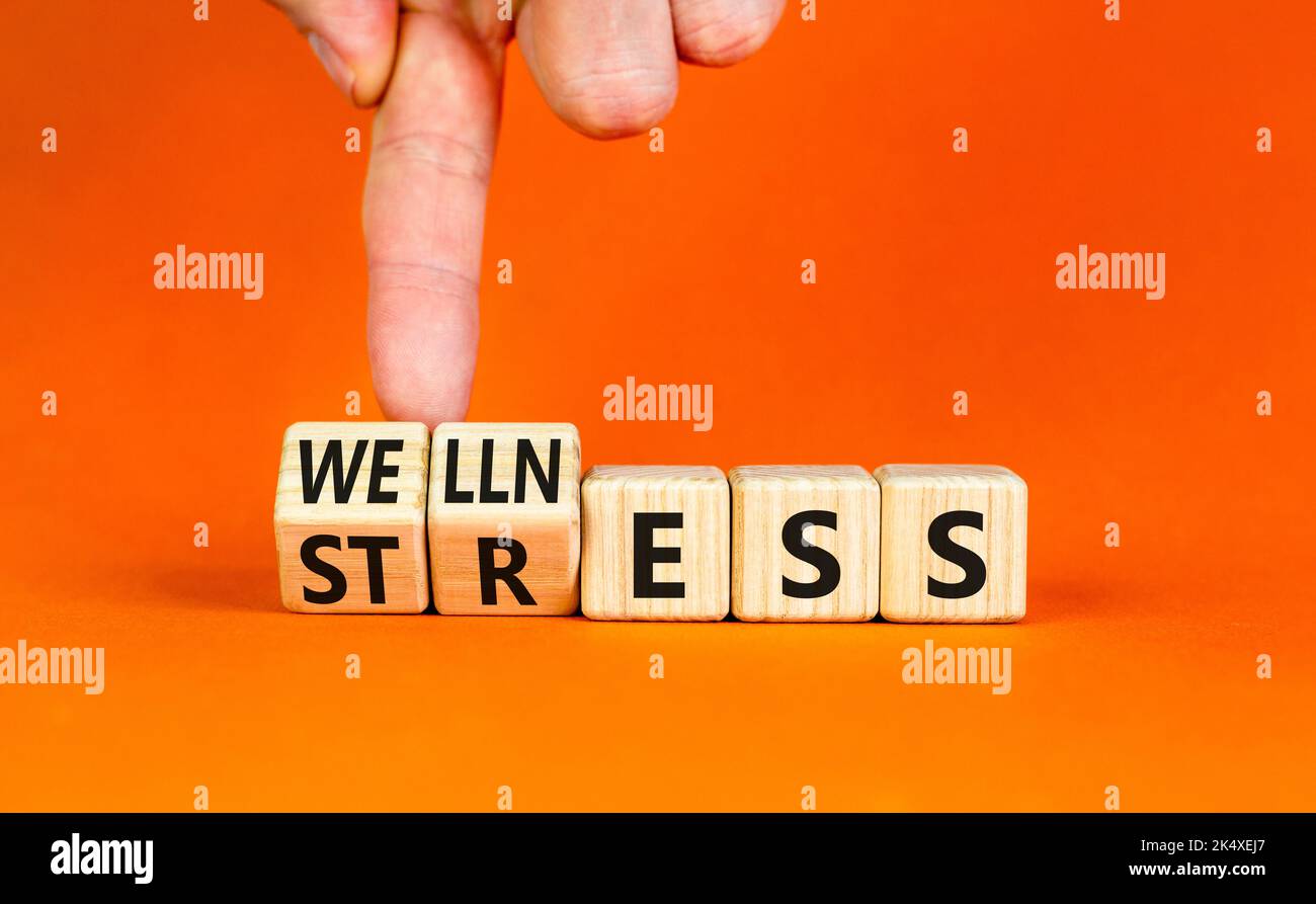 Stress or wellness symbol. Concept words Stress or Wellness on wooden ...