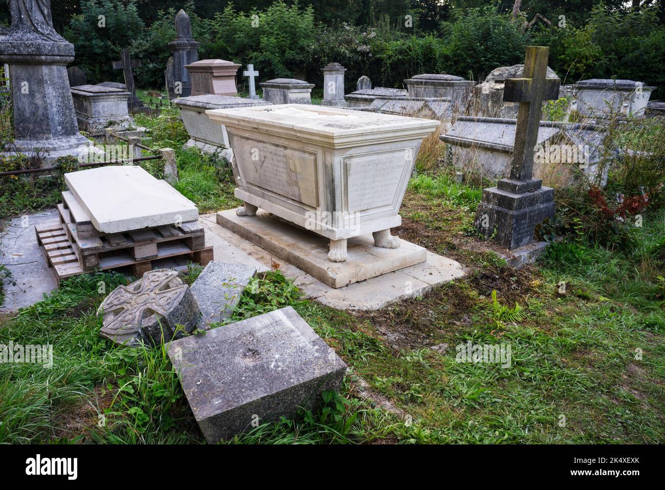A 19th-century table tomb undergoing repair and restoration in ...