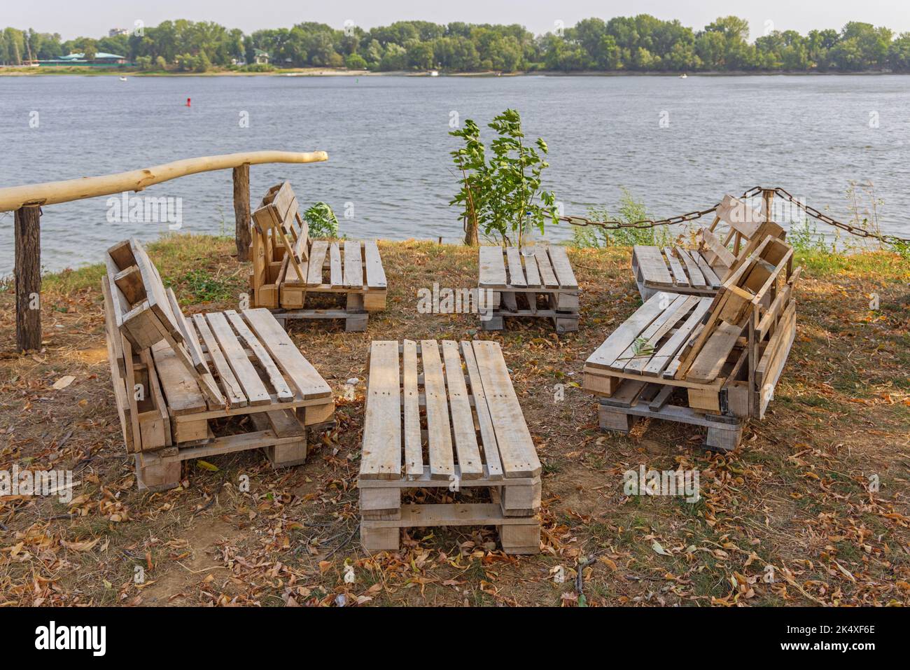 Wooden Cargo Pallets Furniture Set at Danube River Coast Stock Photo ...