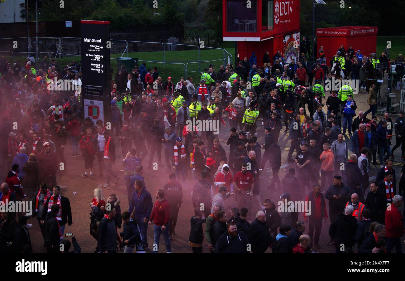 Liverpool fans set off flares as they arrive for the UEFA Champions ...