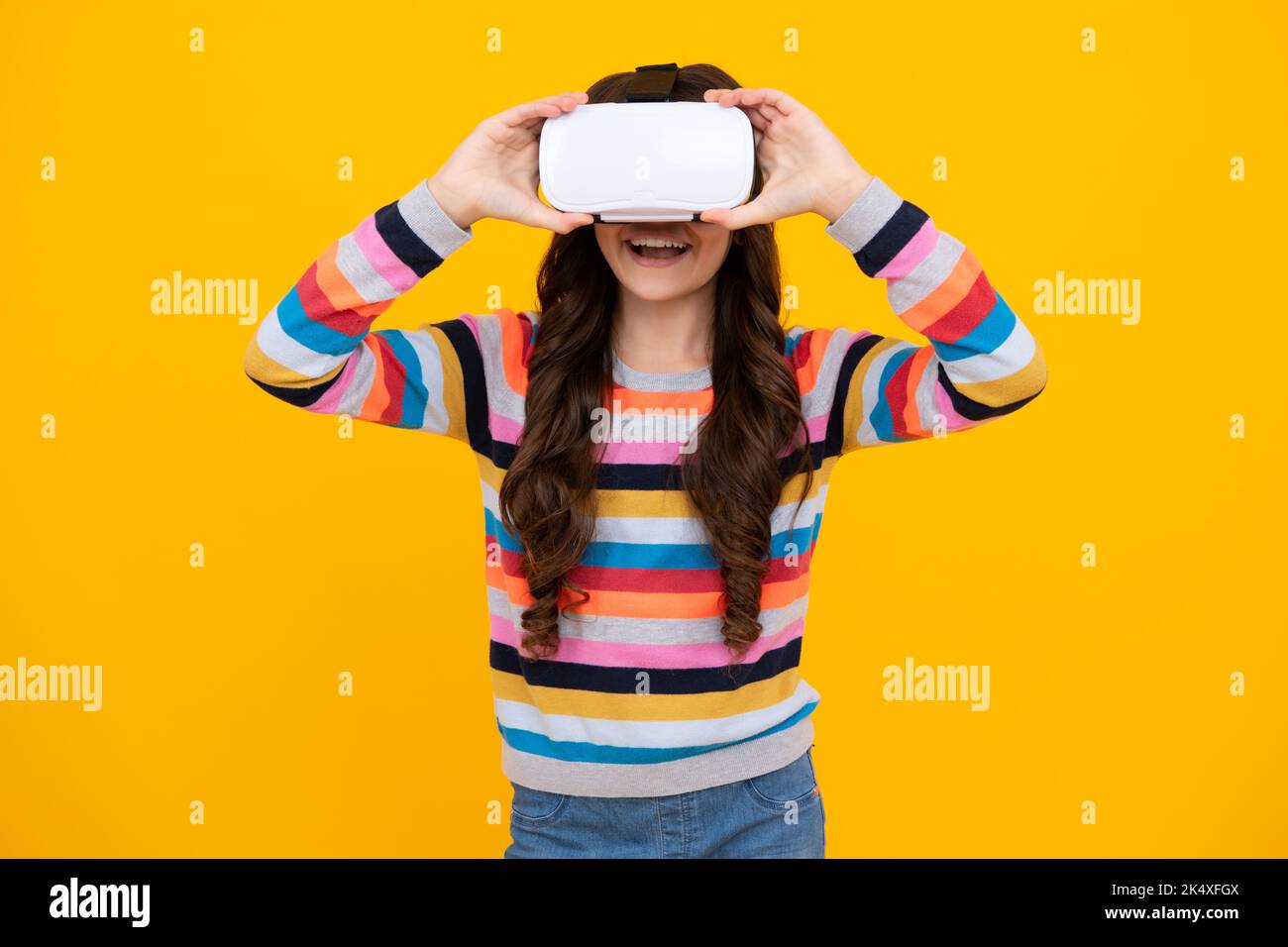 Teen girl wearing virtual reality goggles headset, vr. Connection ...