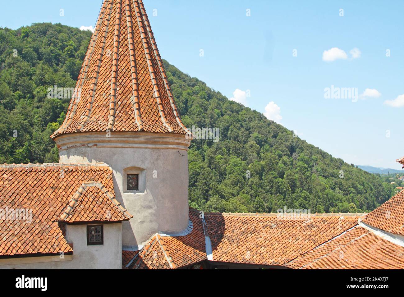 Western tower and rooftops of Bran Castle, Transylvania, Romania. The ...