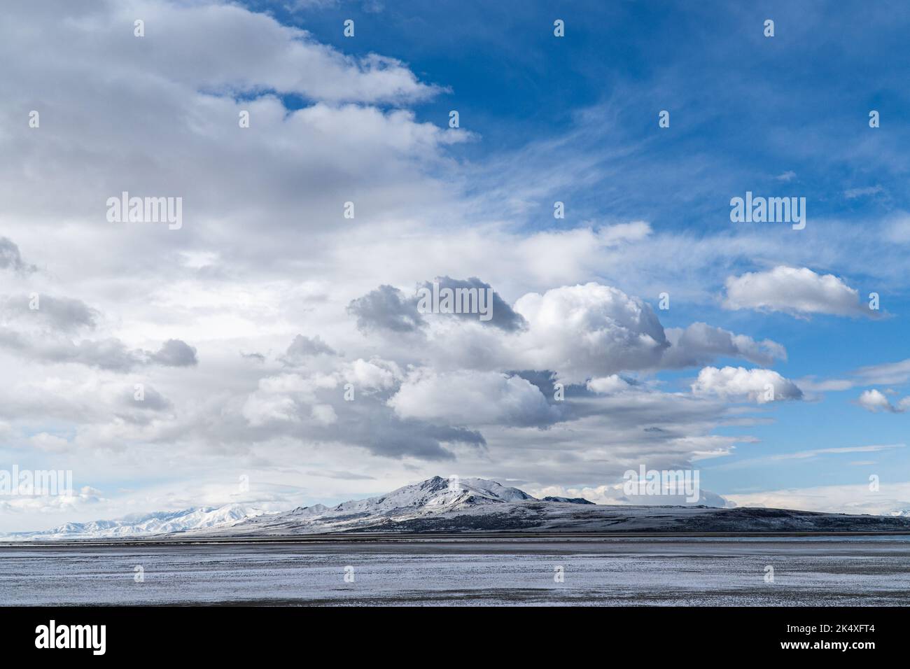A beautiful view of Great Salt Lake and puffy clouds in the sky in ...