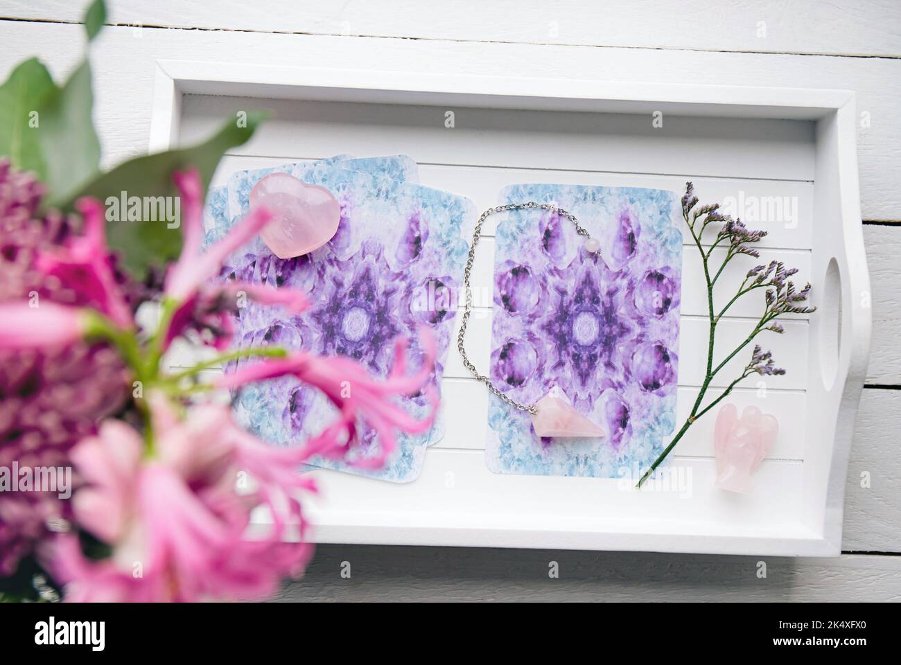 Deck with homemade Angel cards on white tray at home table, surrounded ...