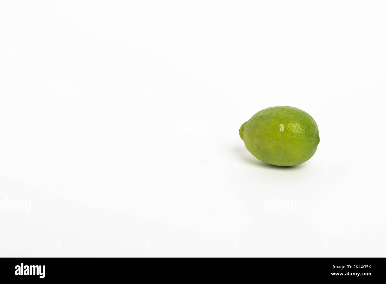 green lime citrus fruit isolated on white background , Fresh lime ... green lime citrus fruit isolated on white background , Fresh lime ...