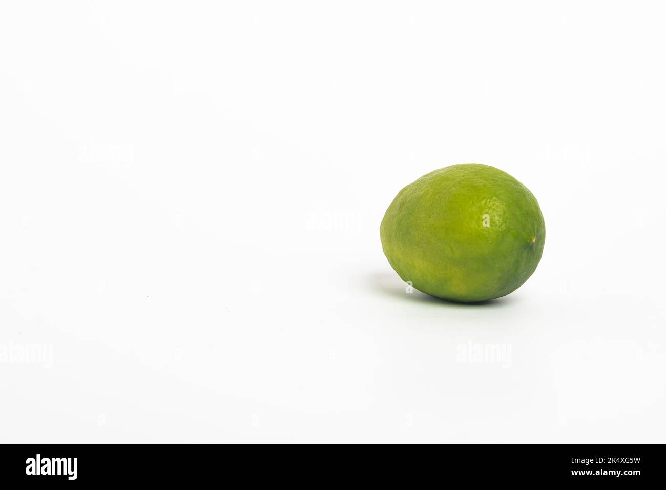 green lime citrus fruit isolated on white background , Fresh lime ... green lime citrus fruit isolated on white background , Fresh lime ...